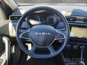 Grey Dacia Duster 2023 in Riga, with an engine capacity of 1.00 L and mileage of 57 thousand km for 14490 €, photo 11 on AUTOMOTO.COM.LV