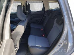 Grey Dacia Duster 2023 in Riga, with an engine capacity of 1.00 L and mileage of 57 thousand km for 14490 €, photo 15 on AUTOMOTO.COM.LV