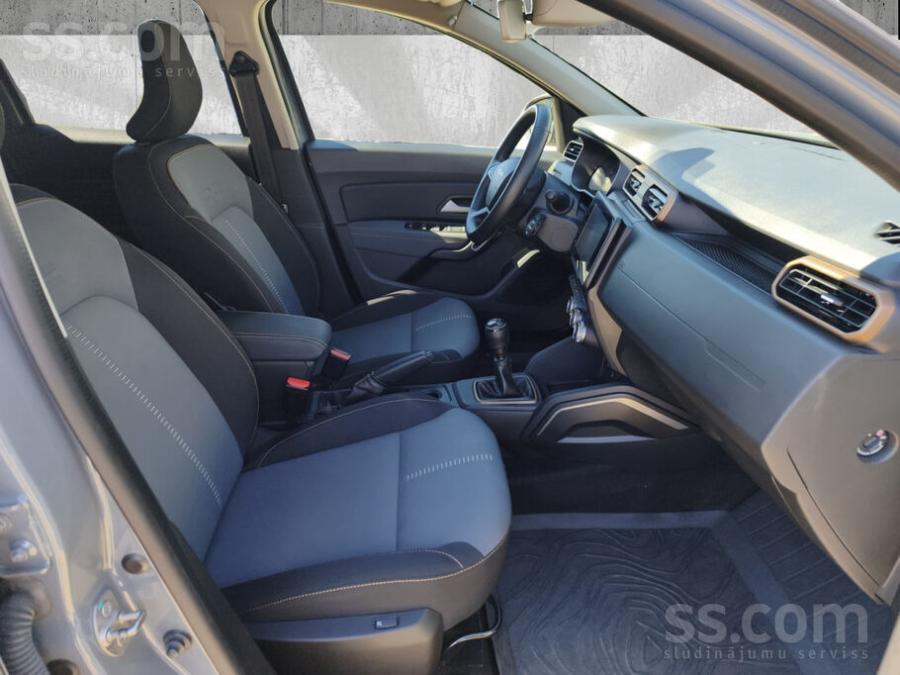 Grey Dacia Duster 2023 in Riga, with an engine capacity of 1.00 L and mileage of 57 thousand km for 14490 €, photo 16 on AUTOMOTO.COM.LV