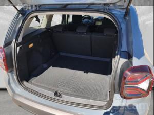 Grey Dacia Duster 2023 in Riga, with an engine capacity of 1.00 L and mileage of 57 thousand km for 14490 €, photo 18 on AUTOMOTO.COM.LV