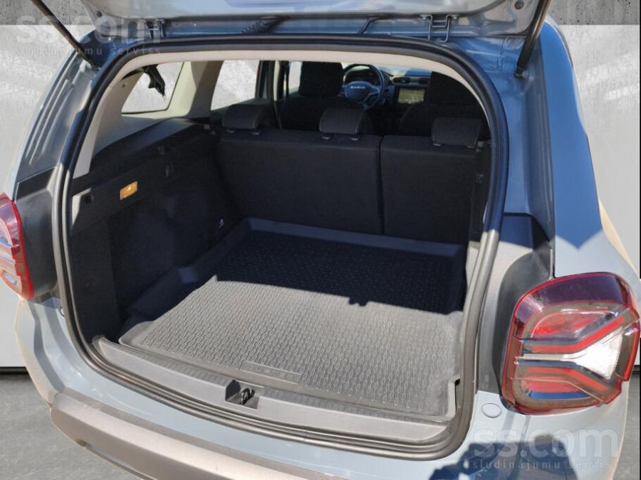 Grey Dacia Duster 2023 in Riga, with an engine capacity of 1.00 L and mileage of 57 thousand km for 14490 €, photo 18 on AUTOMOTO.COM.LV