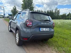 Grey Dacia Duster 2023 in Riga, with an engine capacity of 1.00 L and mileage of 16 thousand km for 15700 €, photo 3 on AUTOMOTO.COM.LV