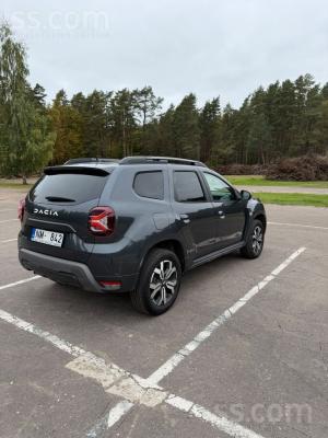 Grey Dacia Duster 2023 in Riga, with an engine capacity of 1.30 L and mileage of 97 thousand km for 14700 €, photo 5 on AUTOMOTO.COM.LV