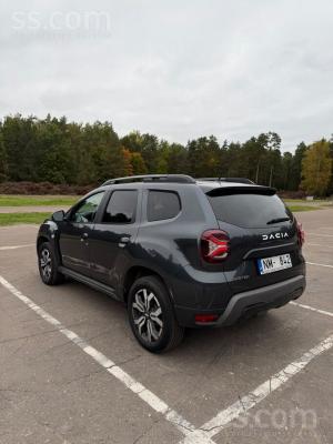 Grey Dacia Duster 2023 in Riga, with an engine capacity of 1.30 L and mileage of 97 thousand km for 14700 €, photo 6 on AUTOMOTO.COM.LV