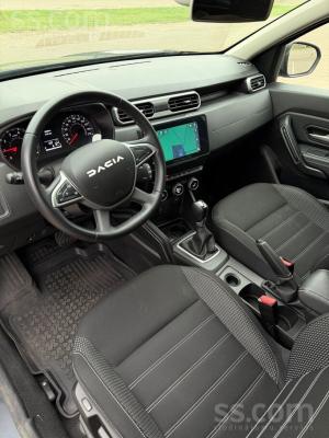 Grey Dacia Duster 2023 in Riga, with an engine capacity of 1.30 L and mileage of 97 thousand km for 14700 €, photo 8 on AUTOMOTO.COM.LV