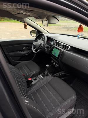 Grey Dacia Duster 2023 in Riga, with an engine capacity of 1.30 L and mileage of 97 thousand km for 14700 €, photo 10 on AUTOMOTO.COM.LV
