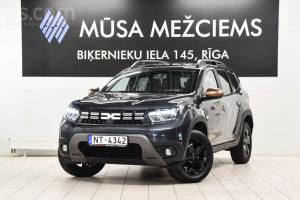 Grey Dacia Duster 2024 in Riga, with an engine capacity of 1.00 L and mileage of 24 thousand km for 16590 €, photo  on AUTOMOTO.COM.LV