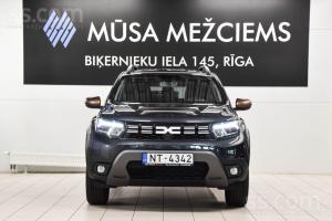Grey Dacia Duster 2024 in Riga, with an engine capacity of 1.00 L and mileage of 24 thousand km for 16590 €, photo 3 on AUTOMOTO.COM.LV