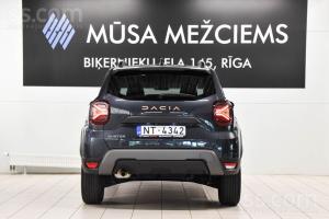 Grey Dacia Duster 2024 in Riga, with an engine capacity of 1.00 L and mileage of 24 thousand km for 16590 €, photo 8 on AUTOMOTO.COM.LV