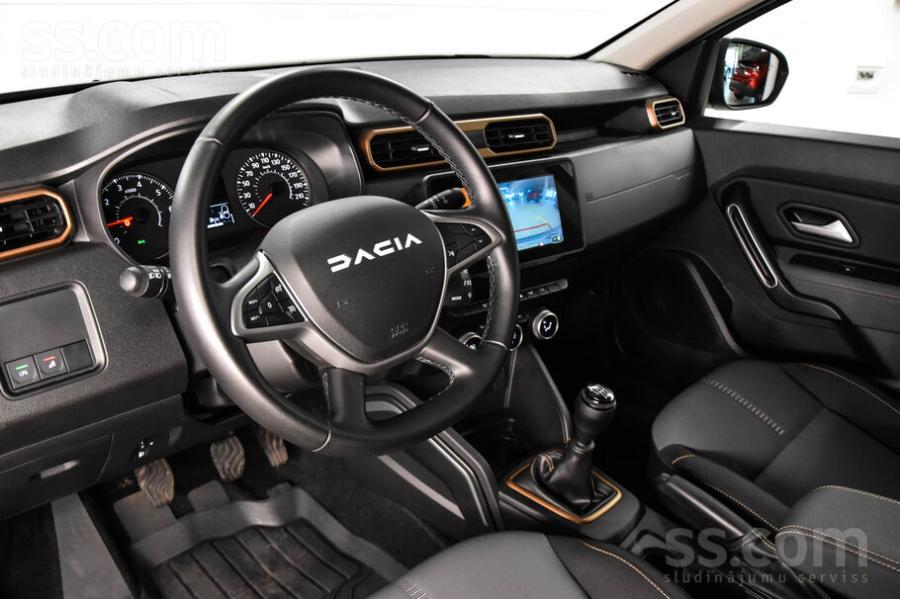 Grey Dacia Duster 2024 in Riga, with an engine capacity of 1.00 L and mileage of 24 thousand km for 16590 €, photo 13 on AUTOMOTO.COM.LV