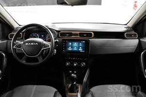 Grey Dacia Duster 2024 in Riga, with an engine capacity of 1.00 L and mileage of 24 thousand km for 16590 €, photo 19 on AUTOMOTO.COM.LV