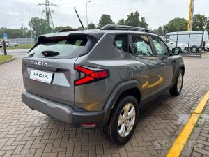 Grey Dacia Duster 2026 in Liepaja, with an engine capacity of 1.20 L and mileage of 0 thousand km for 20640 €, photo 6 on AUTOMOTO.COM.LV