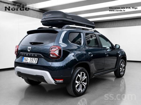 Grey Dacia Duster 2022 in Riga, with an engine capacity of 1.00 L and mileage of 75 thousand km for 12980 €, photo 2 on AUTOMOTO.COM.LV