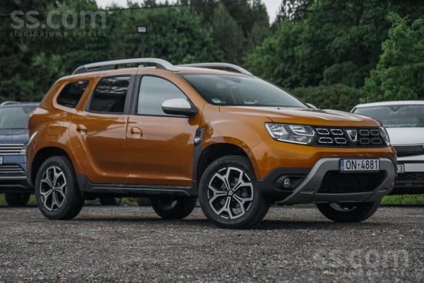 Orange Dacia Duster 2018 in Riga, with an engine capacity of 1.20 L and mileage of 96 thousand km for 11990 €, photo 2 on AUTOMOTO.COM.LV