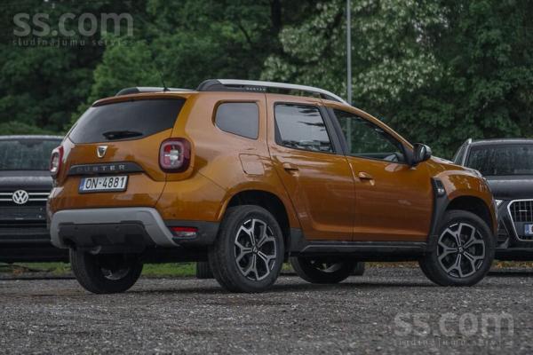 Orange Dacia Duster 2018 in Riga, with an engine capacity of 1.20 L and mileage of 96 thousand km for 11990 €, photo 4 on AUTOMOTO.COM.LV