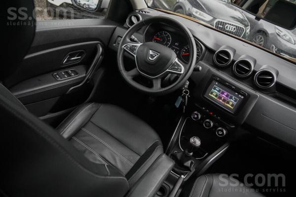 Orange Dacia Duster 2018 in Riga, with an engine capacity of 1.20 L and mileage of 96 thousand km for 11990 €, photo 10 on AUTOMOTO.COM.LV