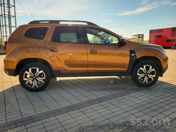 Orange Dacia Duster 2020 in Riga, with an engine capacity of 1.00 L and mileage of 81 thousand km for 11000 €, photo 4 on AUTOMOTO.COM.LV