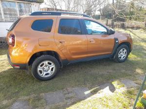 Orange Dacia Duster 2020 in Vilnius, with an engine capacity of 1.00 L and mileage of 61 thousand km for 10300 €, photo 5 on AUTOMOTO.COM.LV