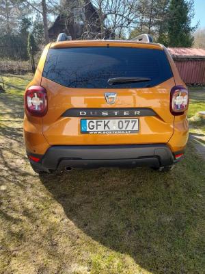 Orange Dacia Duster 2020 in Vilnius, with an engine capacity of 1.00 L and mileage of 61 thousand km for 10300 €, photo 7 on AUTOMOTO.COM.LV