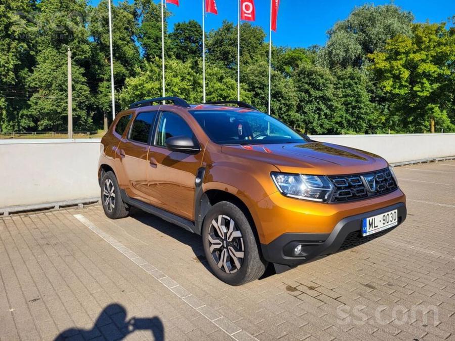 Orange Dacia Duster 2020 in Riga, with an engine capacity of 1.00 L and mileage of 81 thousand km for 9690 €, photo 3 on AUTOMOTO.COM.LV