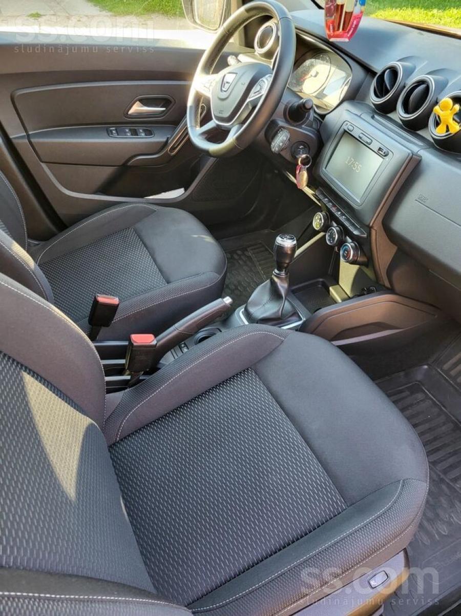 Orange Dacia Duster 2020 in Riga, with an engine capacity of 1.00 L and mileage of 81 thousand km for 9690 €, photo 12 on AUTOMOTO.COM.LV