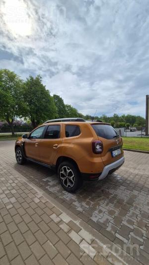 Orange Dacia Duster 2021 in Riga, with an engine capacity of 1.50 L and mileage of 72 thousand km for 11800 €, photo 4 on AUTOMOTO.COM.LV