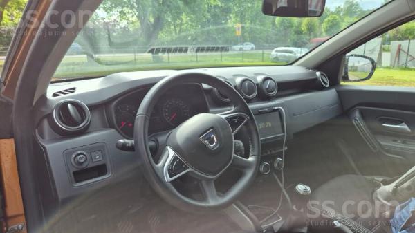 Oranžs Dacia Duster 2021 Rīga, ar dzinēja tilpumu 1.50 L un nobraukumu 72 tūkst. km par 11800 €, foto 6 vietnē AUTOMOTO.COM.LV
