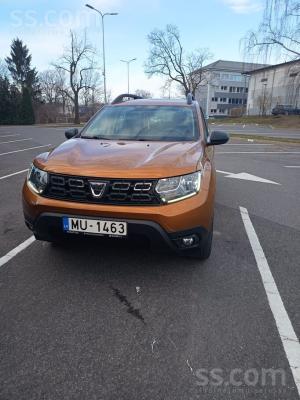Orange Dacia Duster 2021 in Riga, with an engine capacity of 1.00 L and mileage of 63 thousand km for 9000 €, photo  on AUTOMOTO.COM.LV