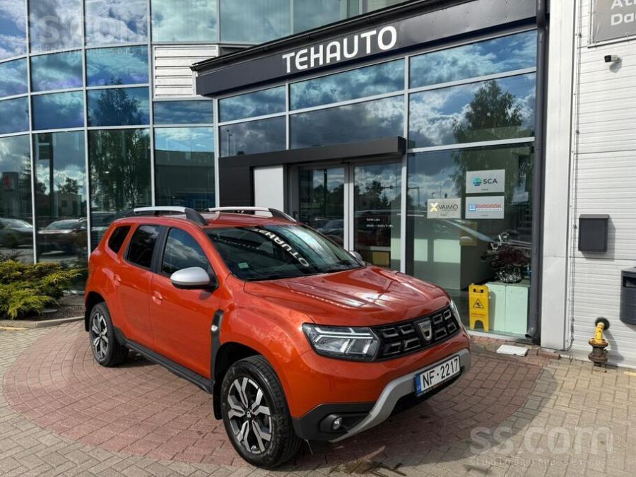 Orange Dacia Duster 2022 in Valmiera, with an engine capacity of 1.00 L and mileage of 82 thousand km for 14999 €, photo 1 on AUTOMOTO.COM.LV