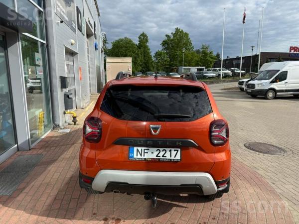 Orange Dacia Duster 2022 in Valmiera, with an engine capacity of 1.00 L and mileage of 82 thousand km for 14999 €, photo 4 on AUTOMOTO.COM.LV
