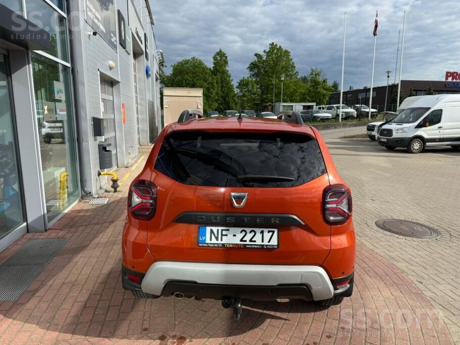 Orange Dacia Duster 2022 in Valmiera, with an engine capacity of 1.00 L and mileage of 82 thousand km for 14999 €, photo 5 on AUTOMOTO.COM.LV