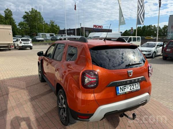 Orange Dacia Duster 2022 in Valmiera, with an engine capacity of 1.00 L and mileage of 82 thousand km for 14999 €, photo 5 on AUTOMOTO.COM.LV
