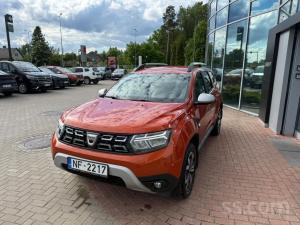 Orange Dacia Duster 2022 in Valmiera, with an engine capacity of 1.00 L and mileage of 82 thousand km for 14999 €, photo 7 on AUTOMOTO.COM.LV