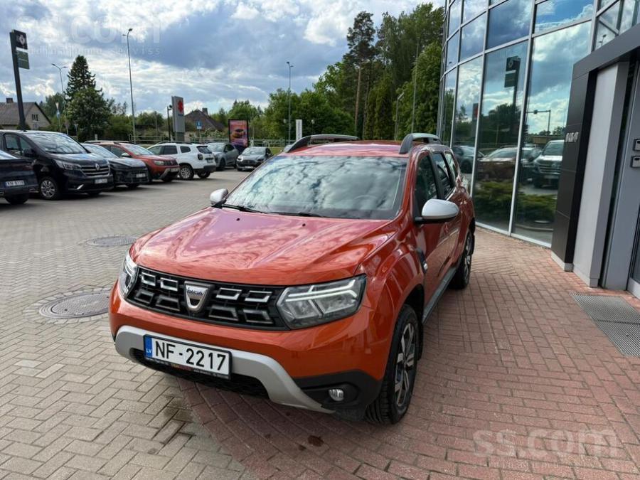 Orange Dacia Duster 2022 in Valmiera, with an engine capacity of 1.00 L and mileage of 82 thousand km for 14999 €, photo 7 on AUTOMOTO.COM.LV