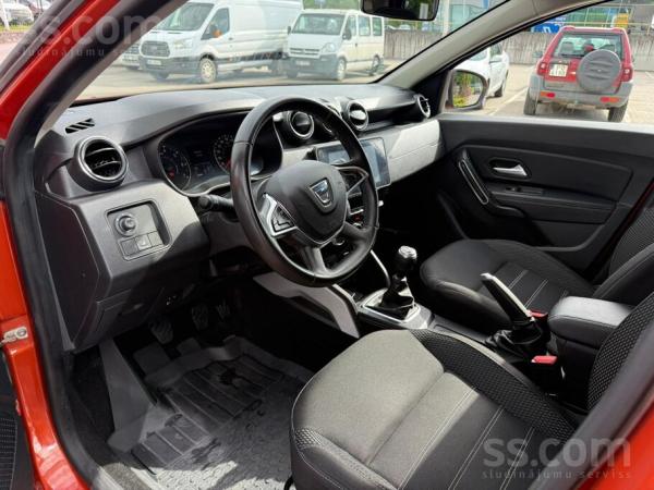 Orange Dacia Duster 2022 in Valmiera, with an engine capacity of 1.00 L and mileage of 82 thousand km for 14999 €, photo 8 on AUTOMOTO.COM.LV
