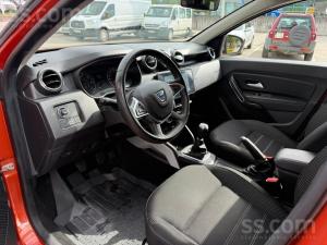 Orange Dacia Duster 2022 in Valmiera, with an engine capacity of 1.00 L and mileage of 82 thousand km for 14999 €, photo 9 on AUTOMOTO.COM.LV