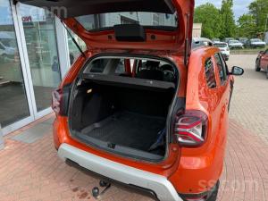 Orange Dacia Duster 2022 in Valmiera, with an engine capacity of 1.00 L and mileage of 82 thousand km for 14999 €, photo 14 on AUTOMOTO.COM.LV