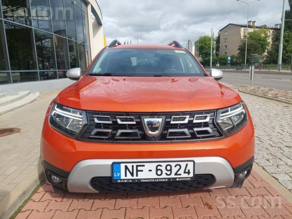 Orange Dacia Duster 2022 in Daugavpils, with an engine capacity of 1.50 L and mileage of 68 thousand km for 16200 €, photo 2 on AUTOMOTO.COM.LV