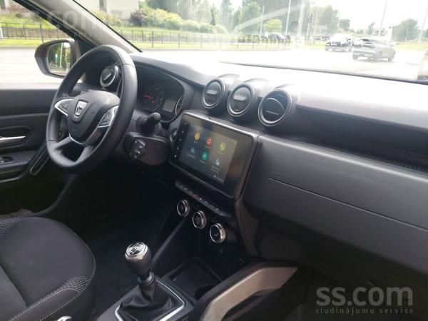Orange Dacia Duster 2022 in Daugavpils, with an engine capacity of 1.50 L and mileage of 68 thousand km for 16200 €, photo 7 on AUTOMOTO.COM.LV