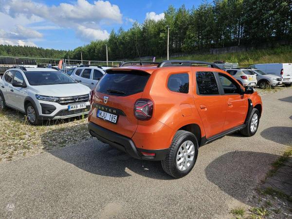Orange Dacia Duster 2022 in Vilnius, with an engine capacity of 1.00 L and mileage of 85 thousand km for 10888 €, photo 5 on AUTOMOTO.COM.LV