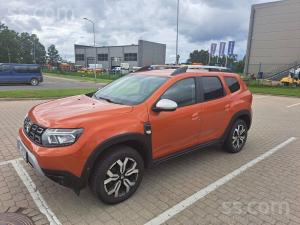 Orange Dacia Duster 2022 in Riga, with an engine capacity of 1.50 L and mileage of 161 thousand km for 14900 €, photo  on AUTOMOTO.COM.LV