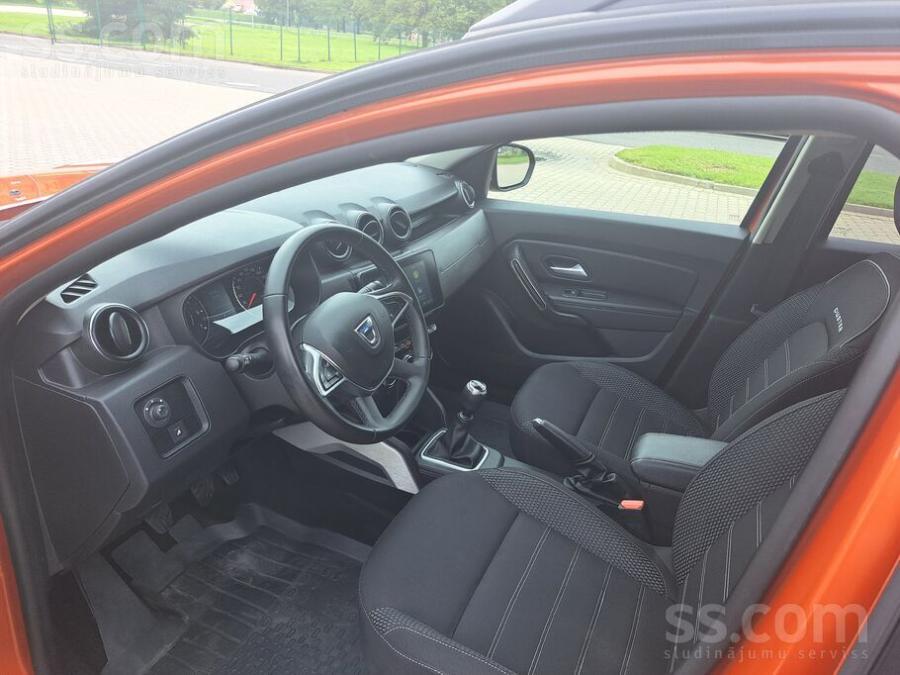 Orange Dacia Duster 2022 in Riga, with an engine capacity of 1.50 L and mileage of 161 thousand km for 14900 €, photo 8 on AUTOMOTO.COM.LV