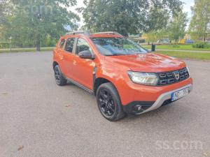 Orange Dacia Duster 2022 in Ogre, with an engine capacity of 1.30 L and mileage of 96 thousand km for 13490 €, photo  on AUTOMOTO.COM.LV
