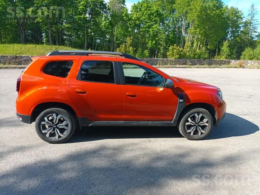 Orange Dacia Duster 2023 in Riga, with an engine capacity of 1.50 L and mileage of 75 thousand km for 18200 €, photo 5 on AUTOMOTO.COM.LV