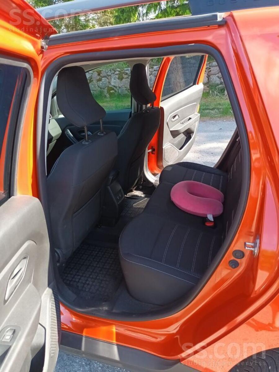 Orange Dacia Duster 2023 in Riga, with an engine capacity of 1.50 L and mileage of 75 thousand km for 18200 €, photo 7 on AUTOMOTO.COM.LV