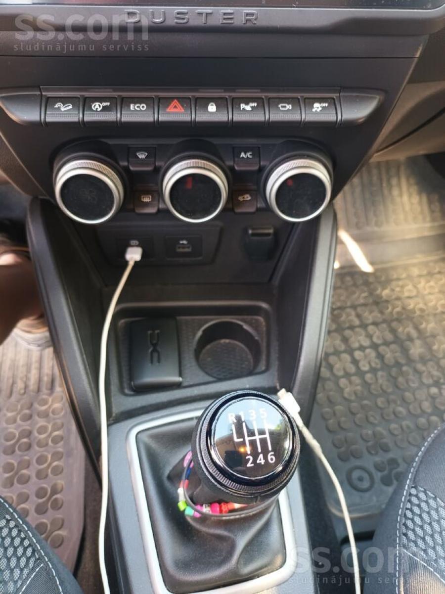 Orange Dacia Duster 2023 in Riga, with an engine capacity of 1.50 L and mileage of 75 thousand km for 18200 €, photo 9 on AUTOMOTO.COM.LV