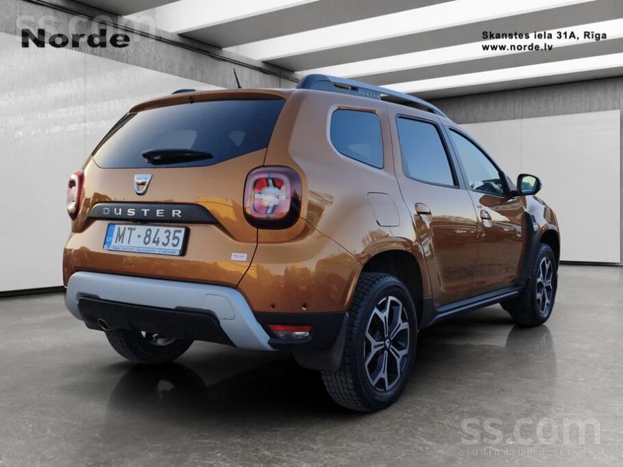 Orange Dacia Duster 2021 in Riga, with an engine capacity of 1.00 L and mileage of 81 thousand km for 10890 €, photo 3 on AUTOMOTO.COM.LV
