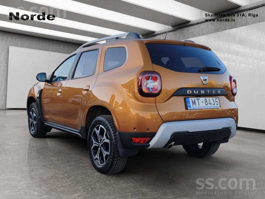 Orange Dacia Duster 2021 in Riga, with an engine capacity of 1.00 L and mileage of 81 thousand km for 10890 €, photo 5 on AUTOMOTO.COM.LV