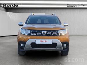 Orange Dacia Duster 2021 in Riga, with an engine capacity of 1.00 L and mileage of 81 thousand km for 10890 €, photo 6 on AUTOMOTO.COM.LV