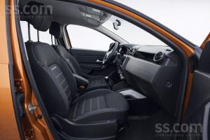 Orange Dacia Duster 2021 in Riga, with an engine capacity of 1.00 L and mileage of 81 thousand km for 10890 €, photo 8 on AUTOMOTO.COM.LV